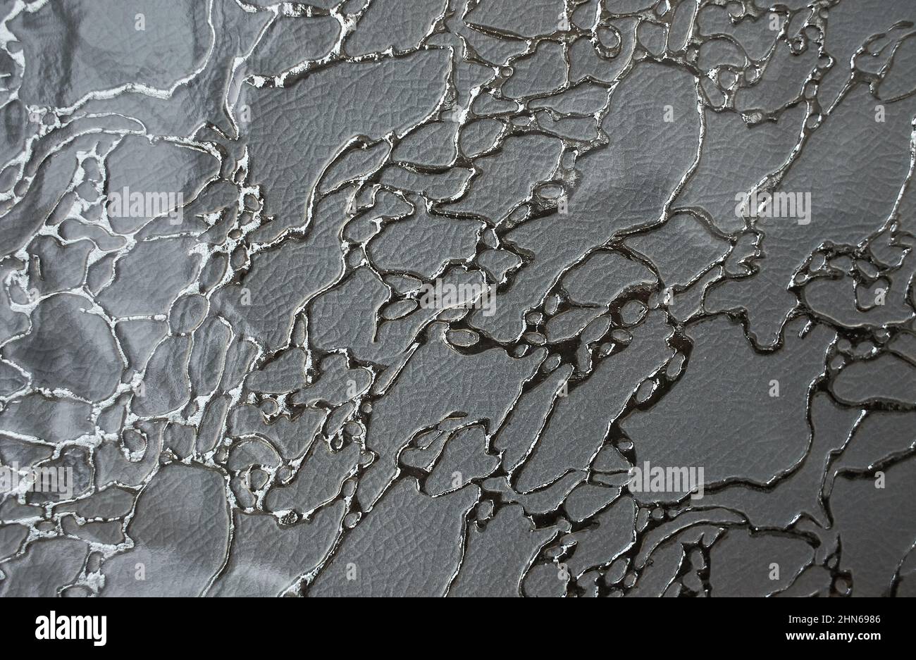 Abstract texture on the surface of opaque decorative glass. patterned ...