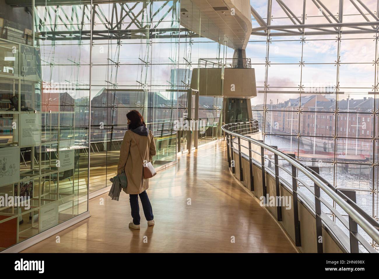 A woman visiting the Royal Danish Library in Copenhagen, Denmark Stock ...