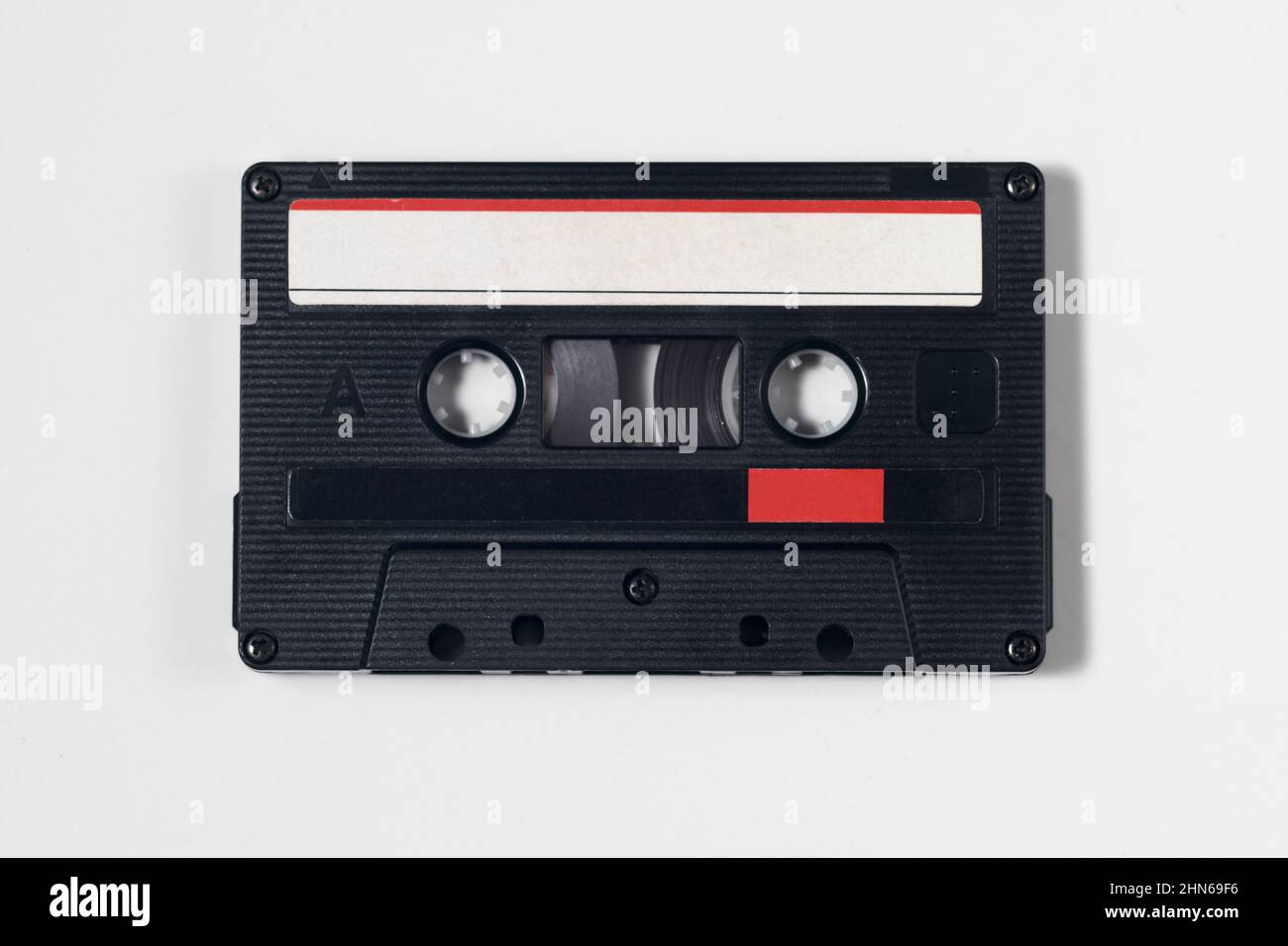 Vintage audio cassette isolated white background. red and white label ...