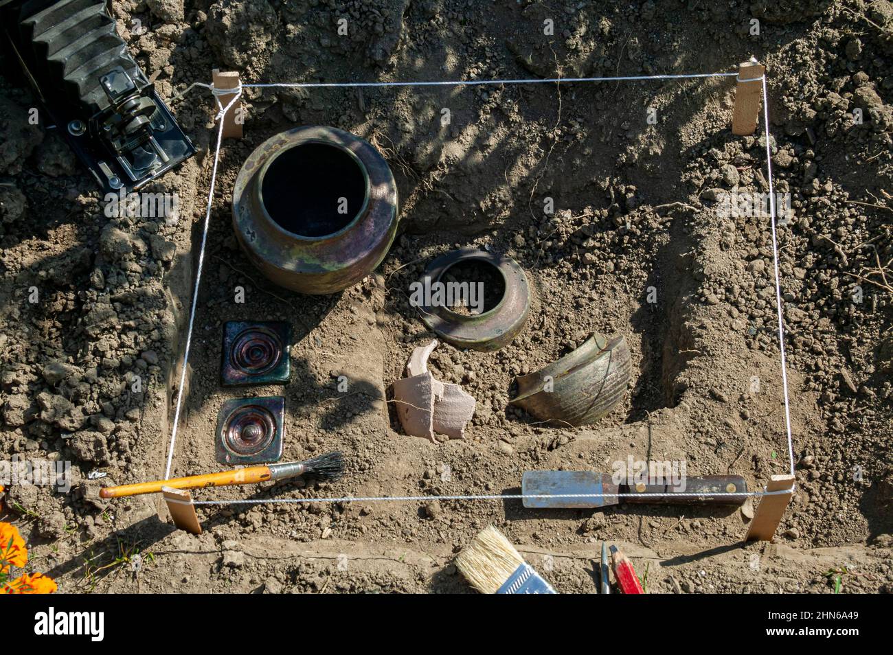 Pottery discovery while digging in the garden Stock Photo - Alamy