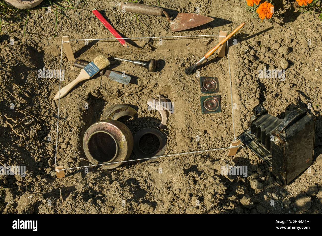 Pottery discovery while digging in the garden Stock Photo - Alamy