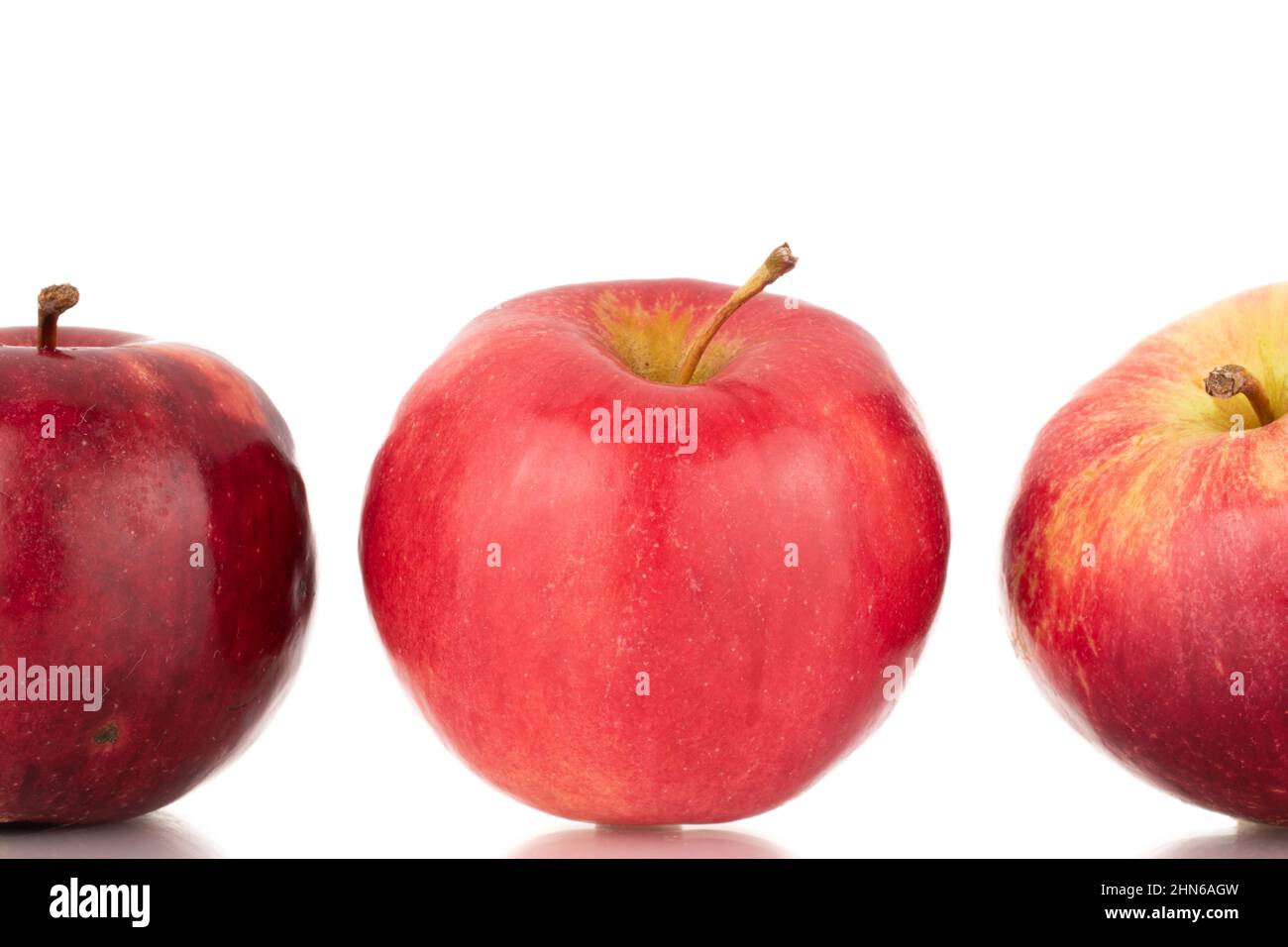Three ripe red apples, macro, isolated on white background Stock Photo ...