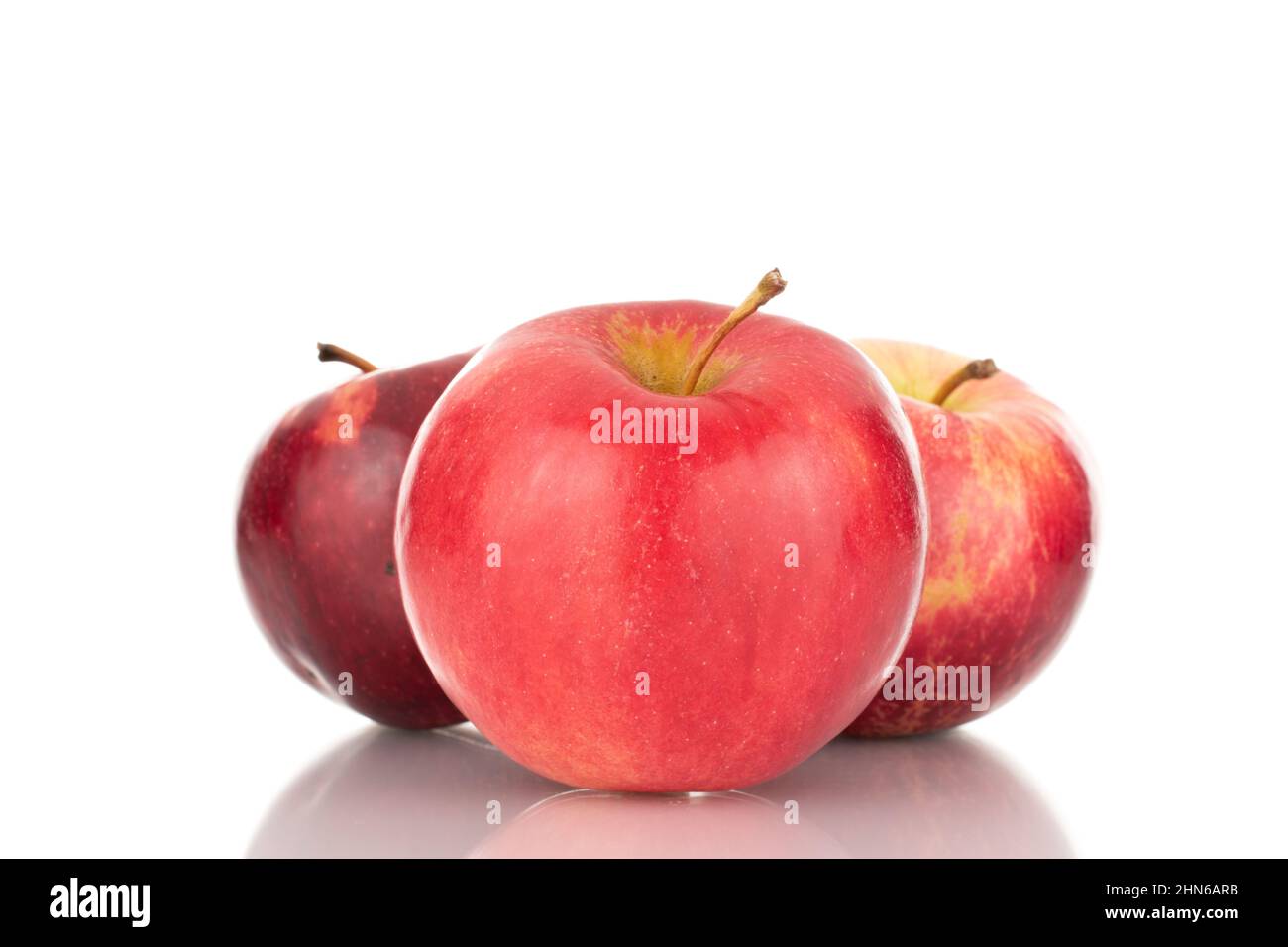 Three ripe red apples, macro, isolated on white background Stock Photo ...