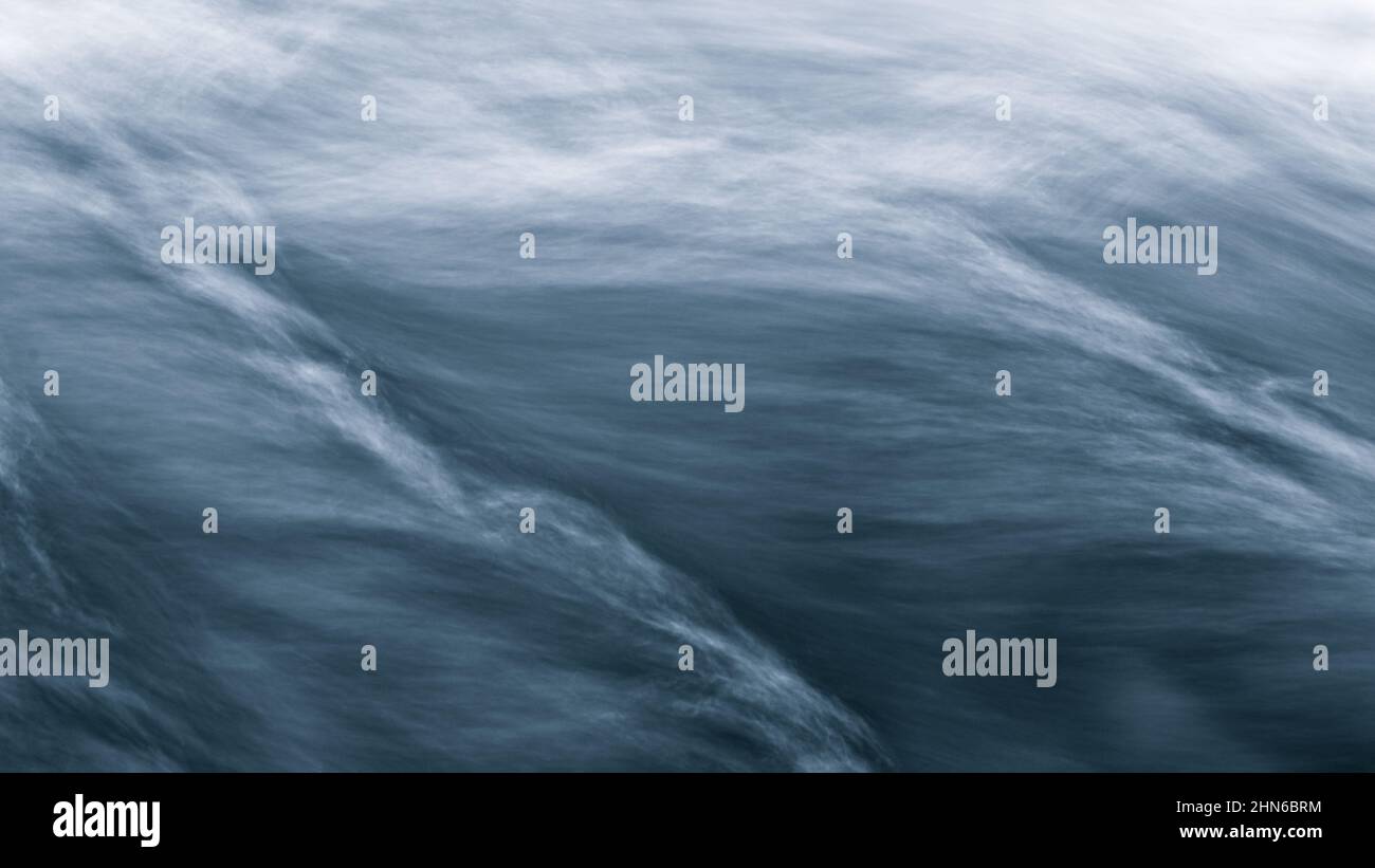 quick blue water of a stream Stock Photo - Alamy