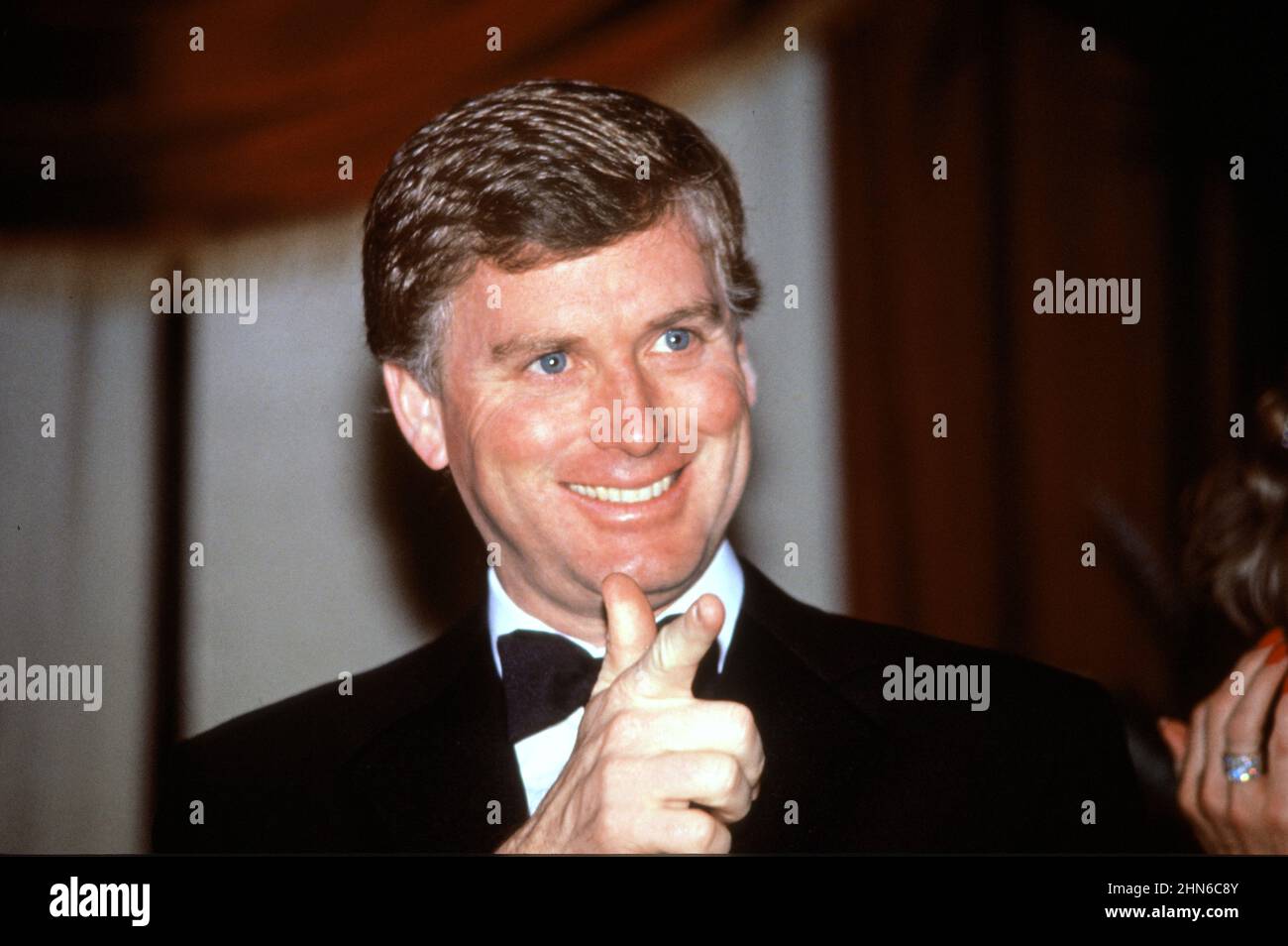 United States Vice President-elect Dan Quayle gestures to a supporter ...