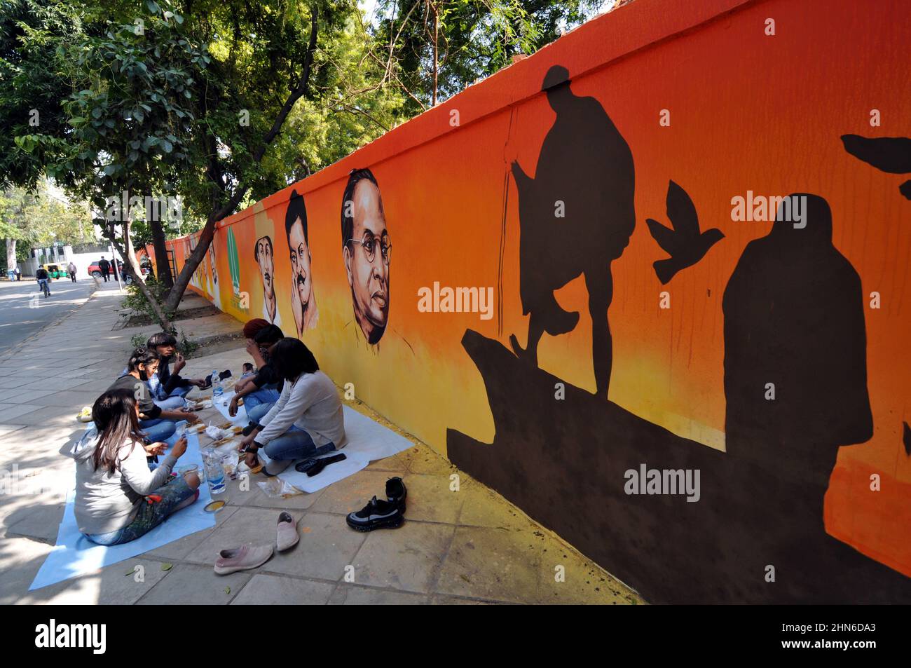 Delhi Street Art Group members makes the finishing touches on the ...