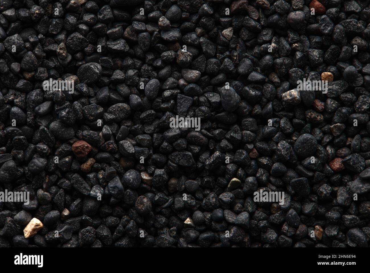 Texture of black volcanic sand for background. Black Sand beach macro ...