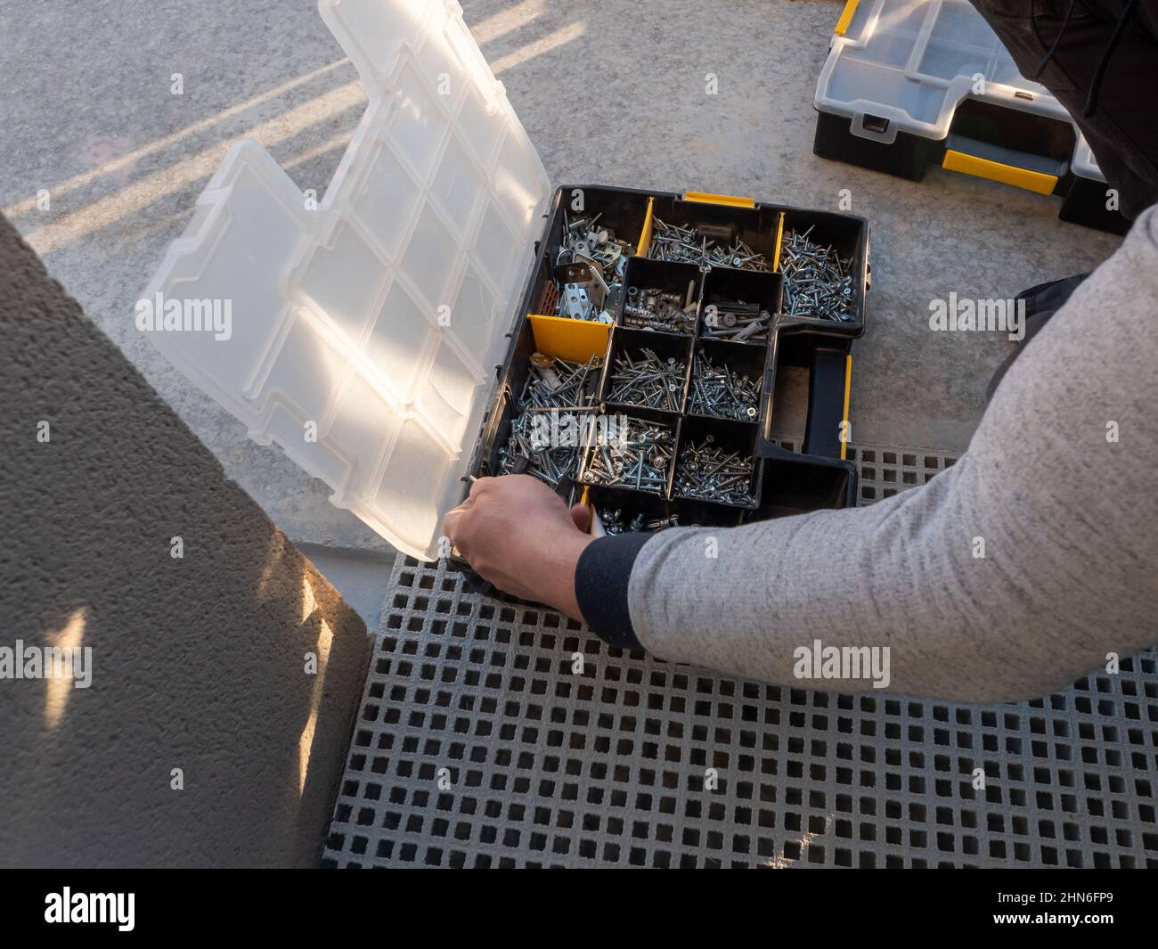box with screws - professional tools for the installer Stock Photo - Alamy