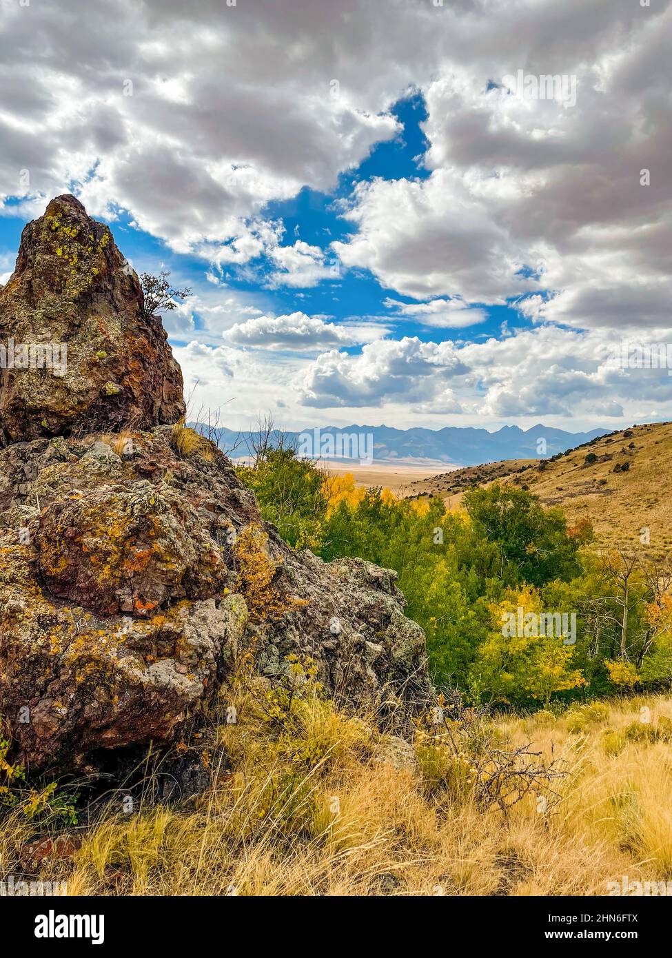 Views of the Rocky Mountains with Rock Formation and Aspen Trees Stock ...