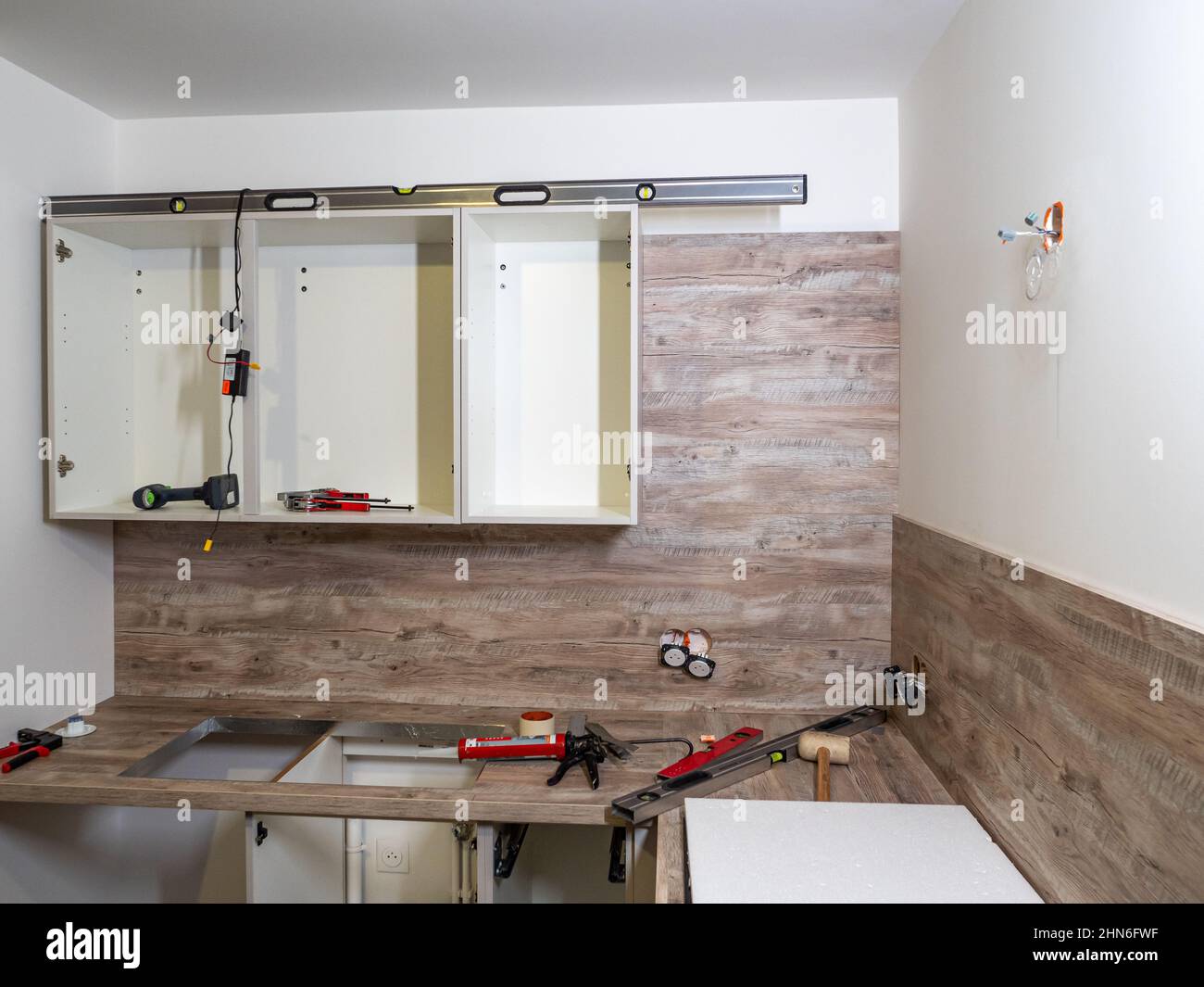 Installing cabinets hi-res stock photography and images - Alamy