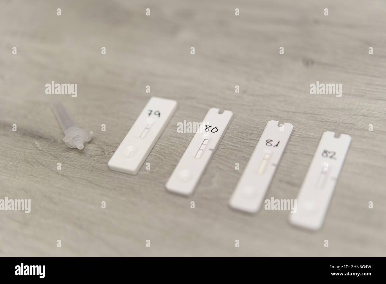 Covid-19 antigen test with negative and positive results Stock Photo ...