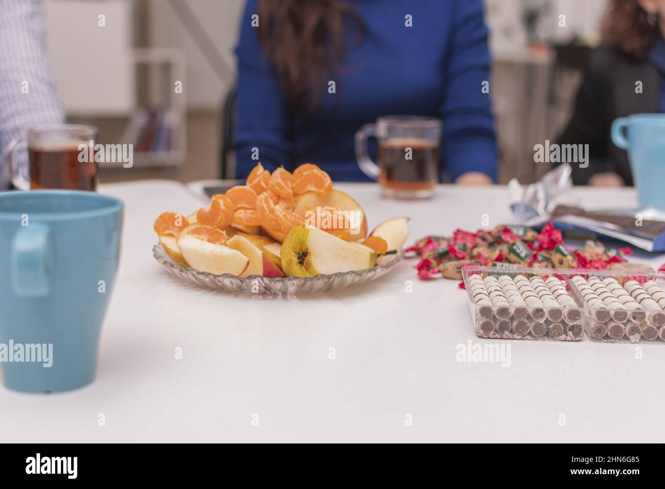 Delicious snacks for tea and coffee - fresh fruits, sweets and cookies ...