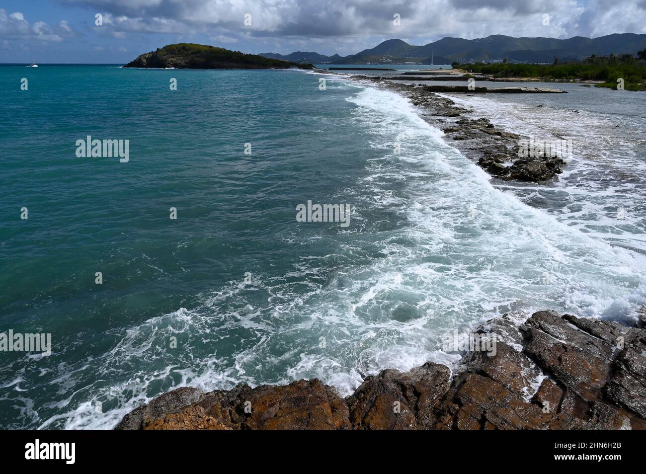 The coast of Saint-Martin at the Trou David, an eroded blowhole in the ...
