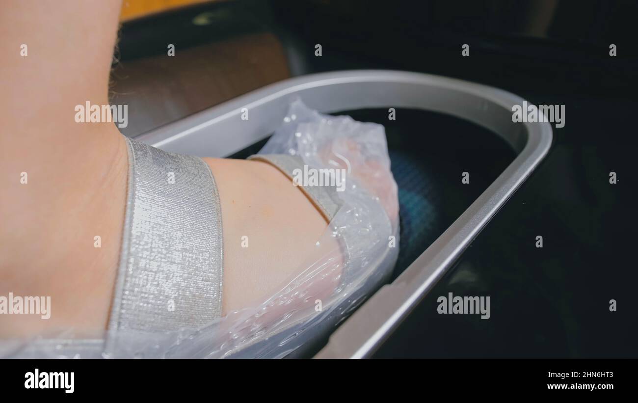 Automatic Thermal Shrinkable Shoe Cover Laminating Machine. Close up ...