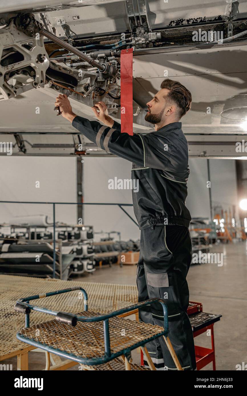 Airplane repair hi-res stock photography and images - Alamy