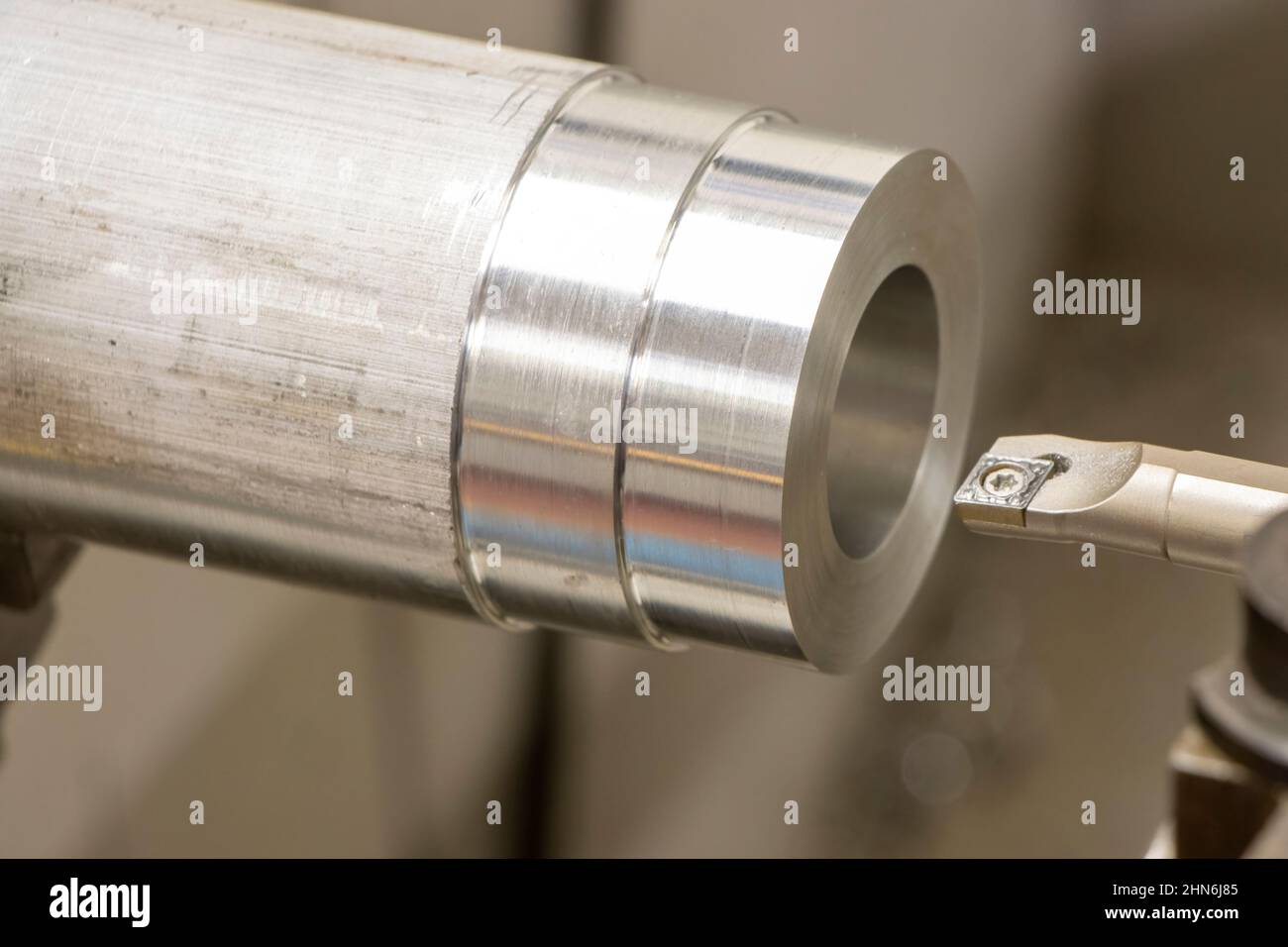 A close up of a Lathe chuck, revolving during a boring process Stock ...