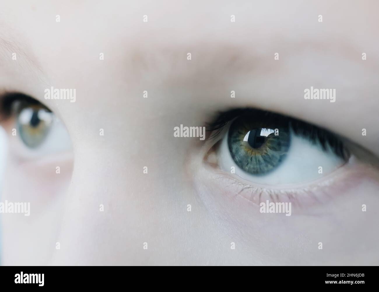 Blue curious eyes, face and skin of little boy macro close up Stock ...