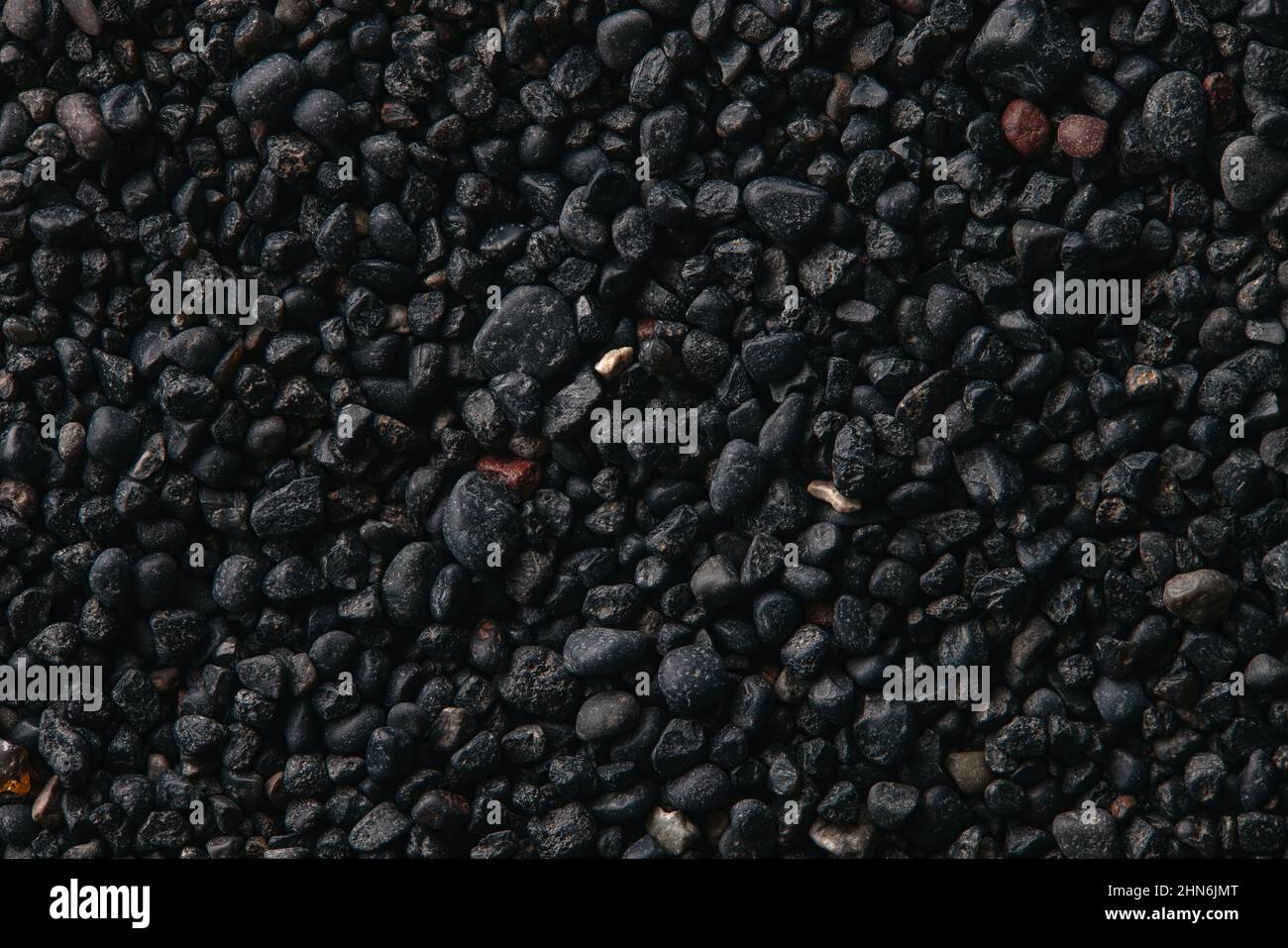Texture of black volcanic sand for background. Black Sand beach macro ...