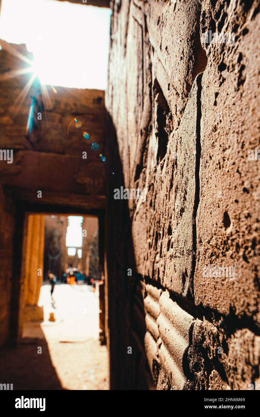 Close focus on a wall in a temple in egypt, ancient stone walls and ...