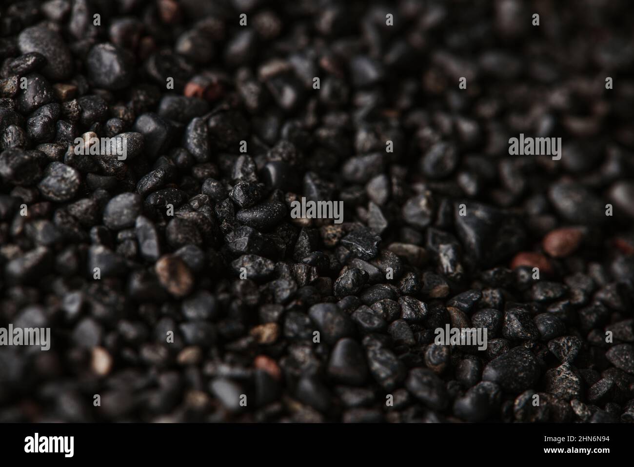 Texture of black volcanic sand for background. Black Sand beach macro ...