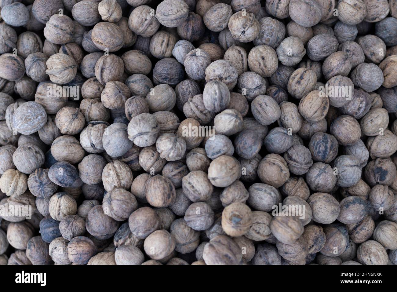 Walnuts natural background or texture Stock Photo - Alamy