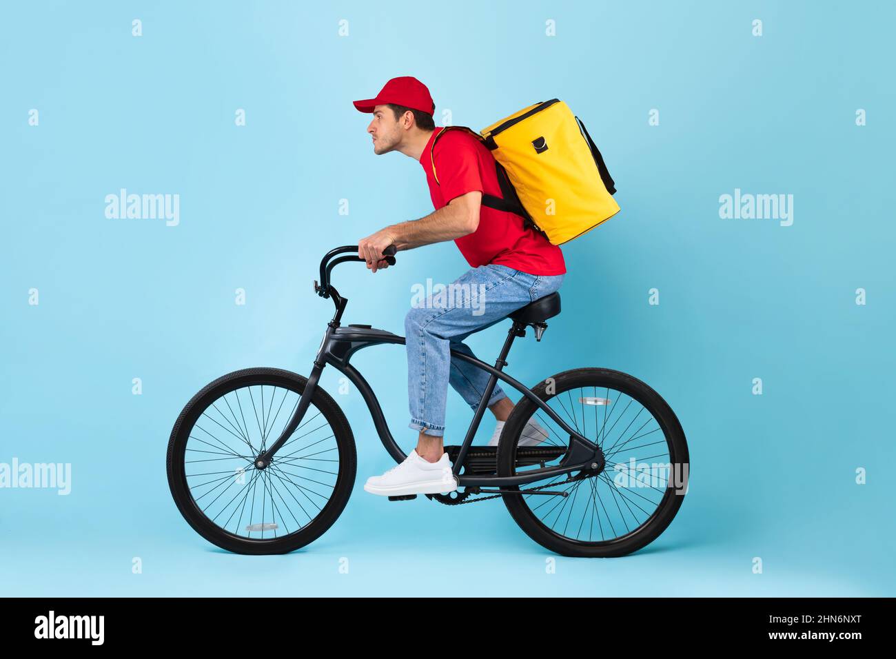 Courier Guy Riding Bike Delivering Meal, Blue Background, Side View ...