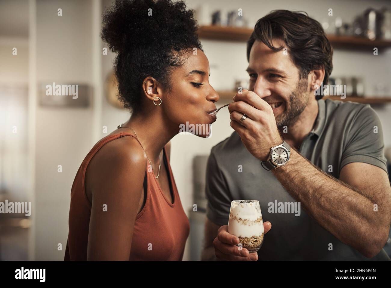 Wife feeding her husband hi-res stock photography and images - Alamy