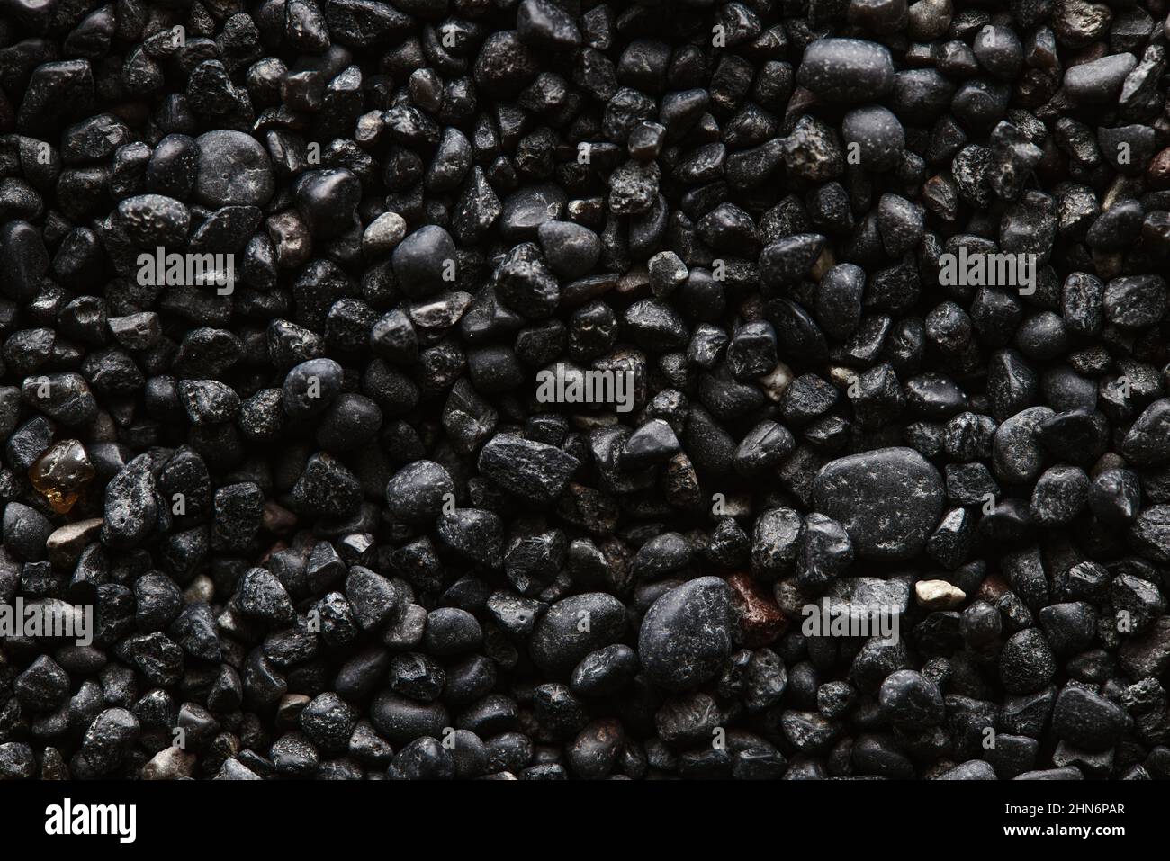Texture of black volcanic sand for background. Black Sand beach macro ...