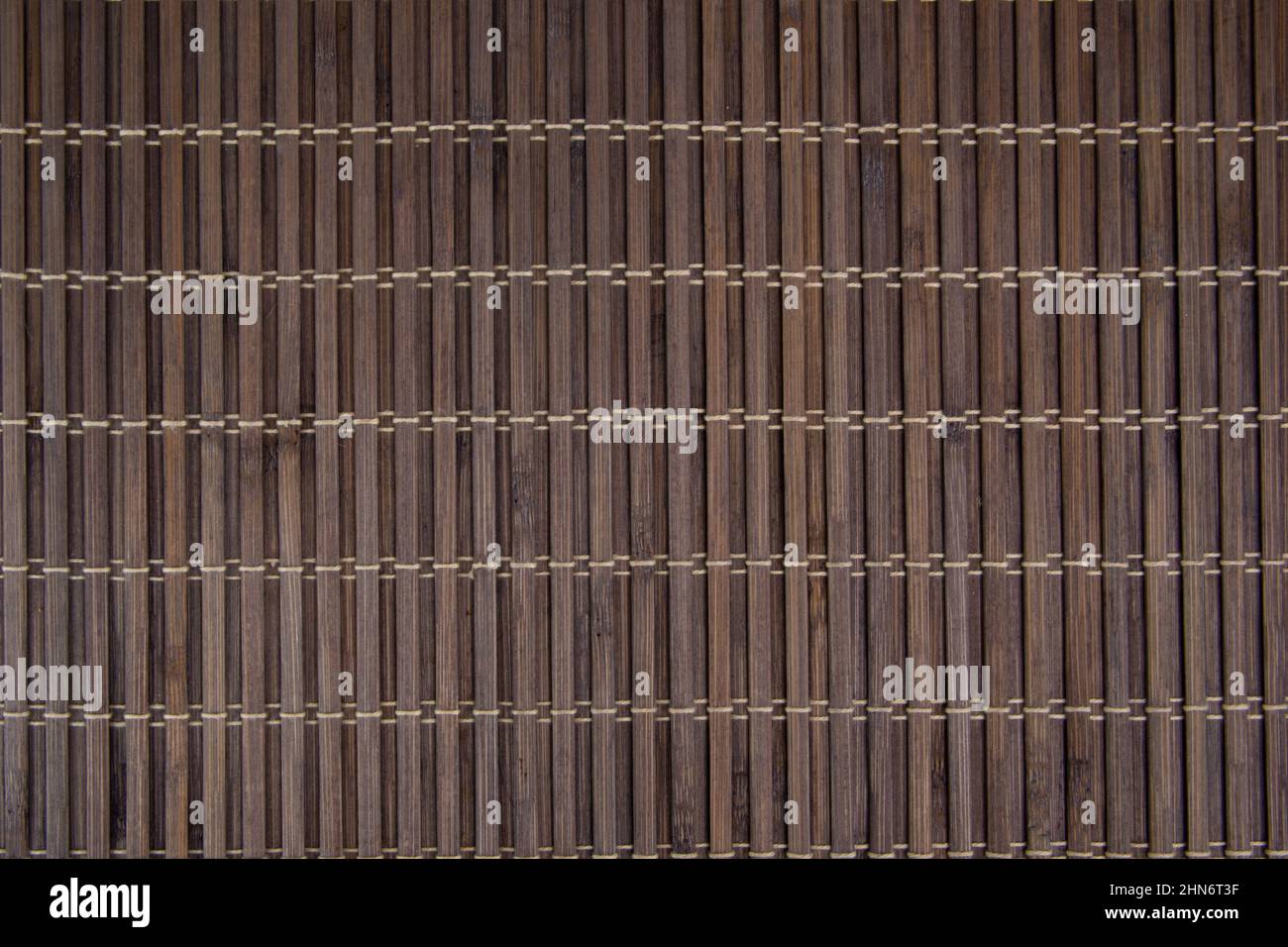Dark old bamboo mat texture or background Stock Photo - Alamy
