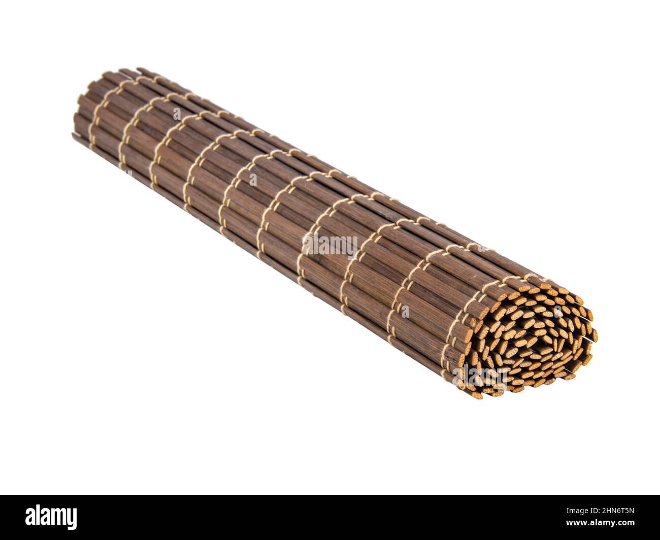 Rolled bamboo mat for food dark color isolated on the white background ...