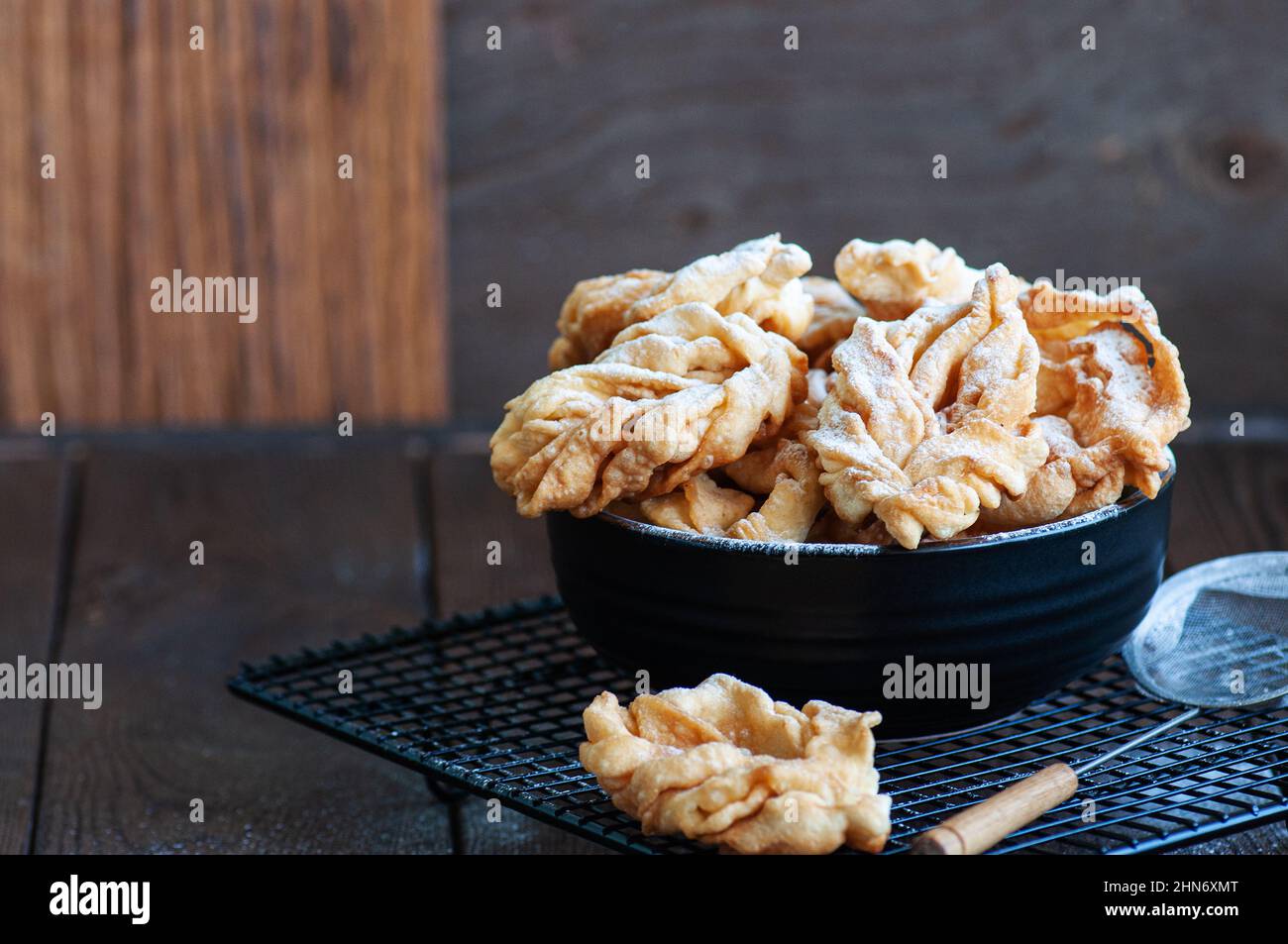 Angel wings, deep-fried sweet crisp pastry sprinkled with powdered ...