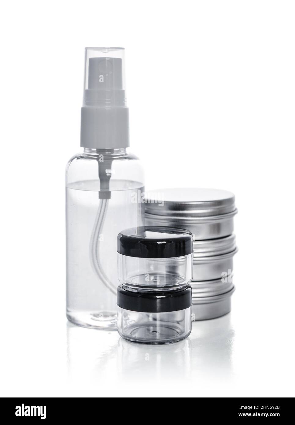 Plastic transparent spray bottle, metal round tin cosmetic can and ...