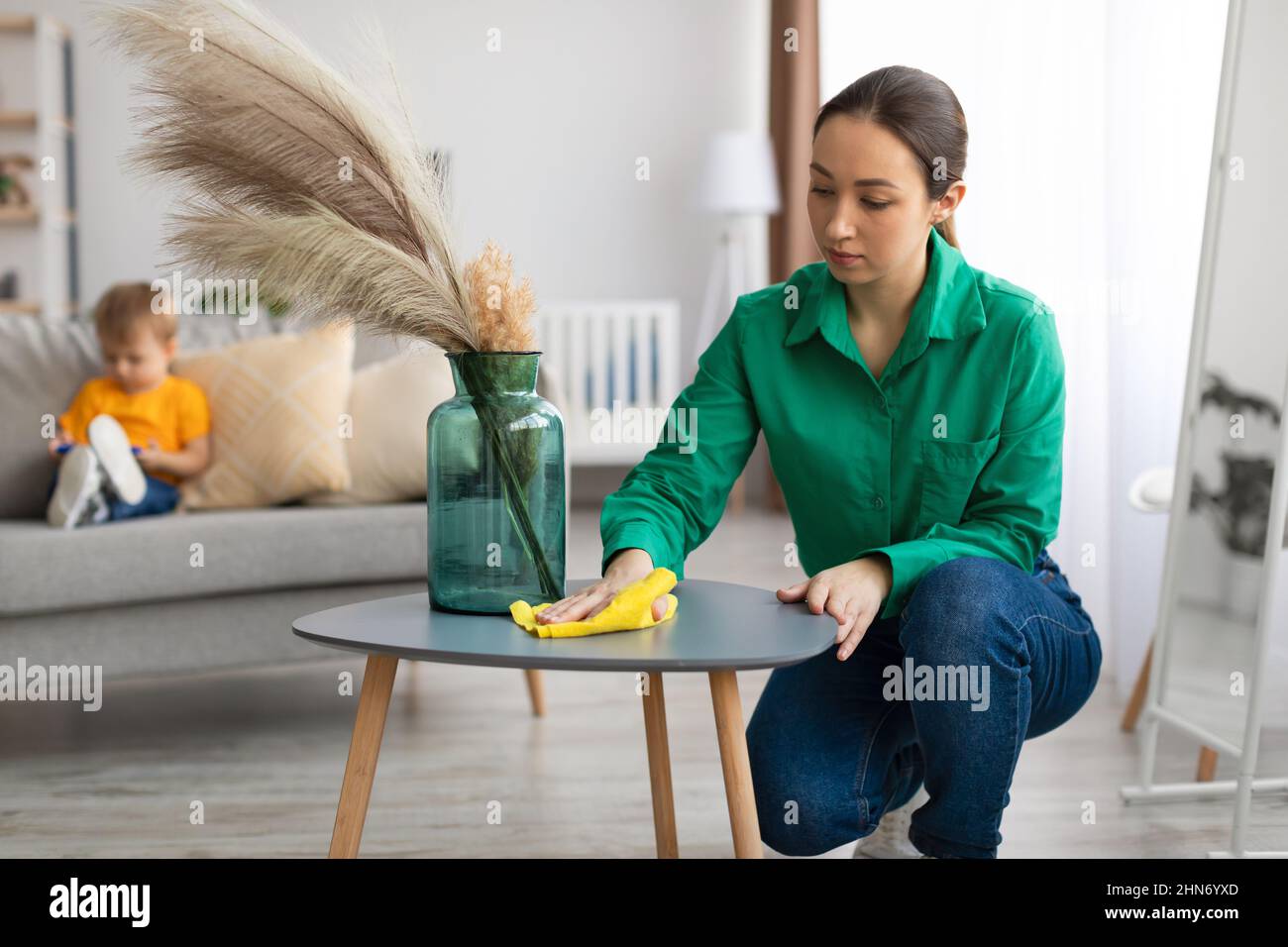 Boy Cleaning Table