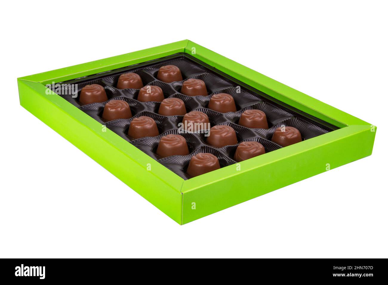 Chocolate sweets candy in green paper box isolated on the white ...