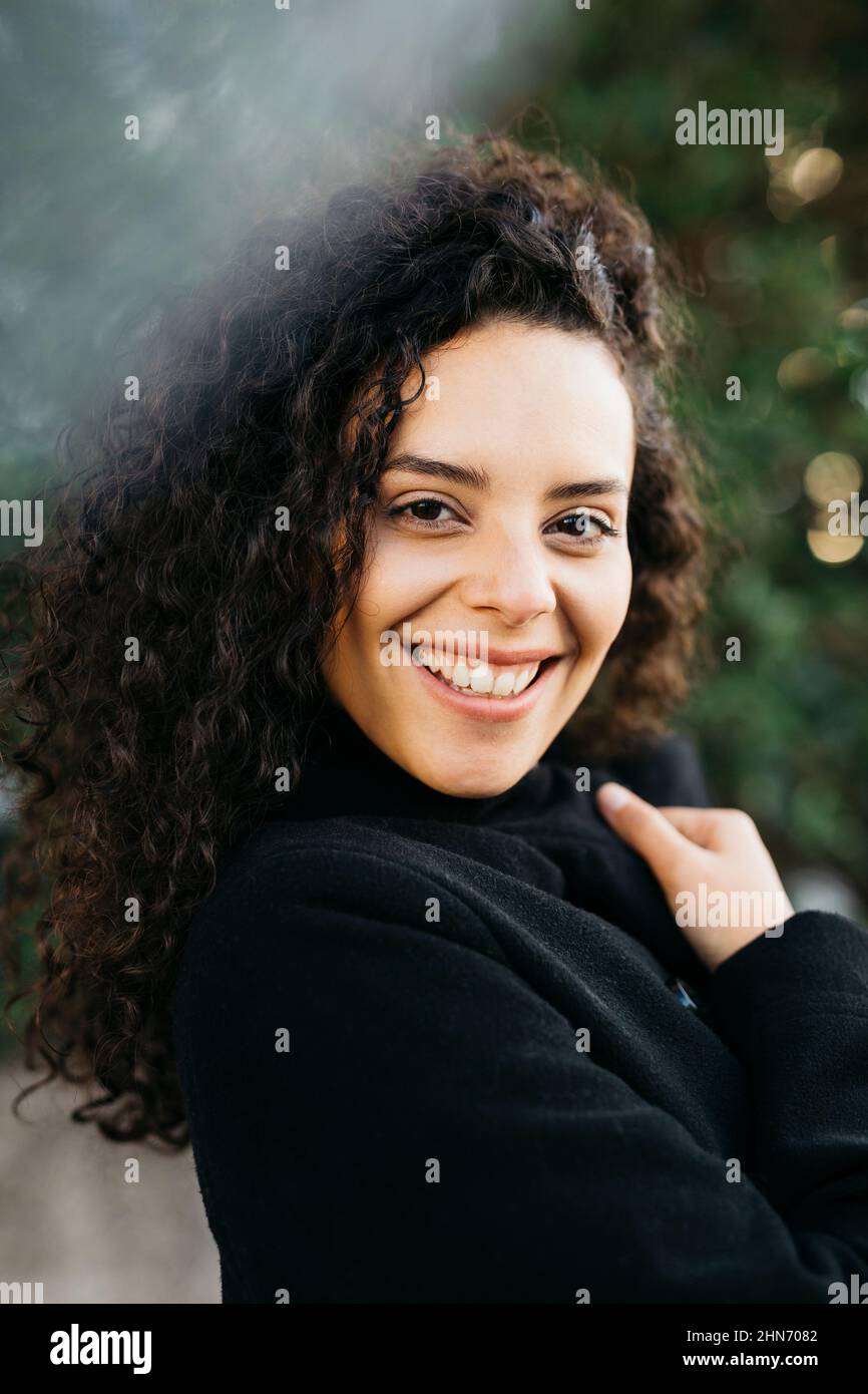 Portrait of a young latin american woman outdoors Stock Photo - Alamy