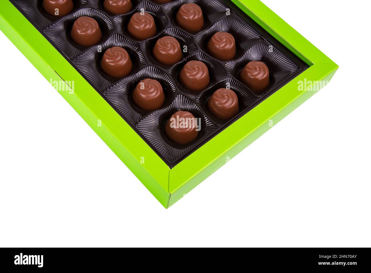 Chocolate sweets candy in green paper box isolated on the white ...
