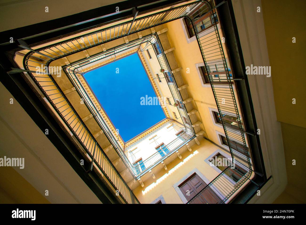 Symmetrical photography. Old building bottom up view. A photo ...