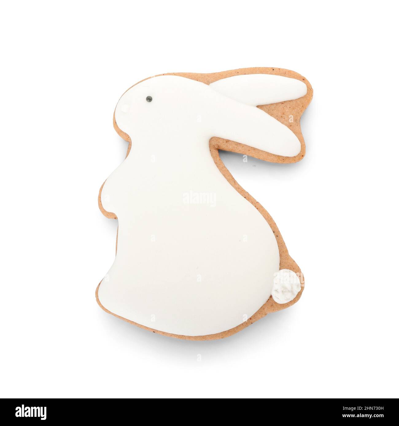 Delicious Easter cookie in shape of bunny on white background Stock ...