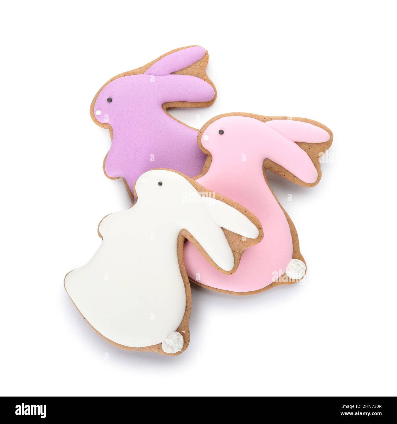 Delicious Easter cookies in shape of bunny on white background Stock ...