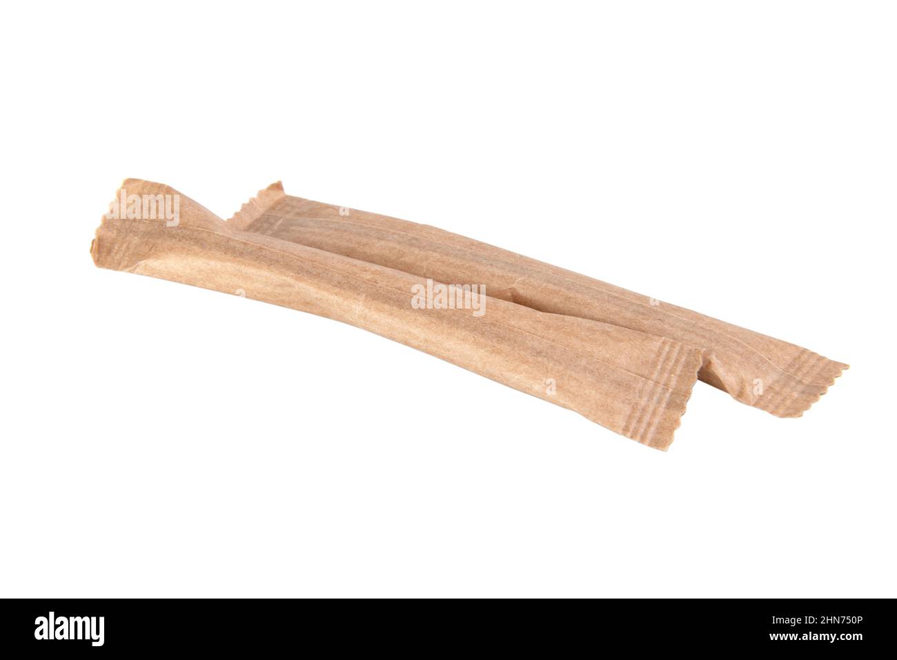 Craft paper two sugar sticks isolated on the white background Stock ...