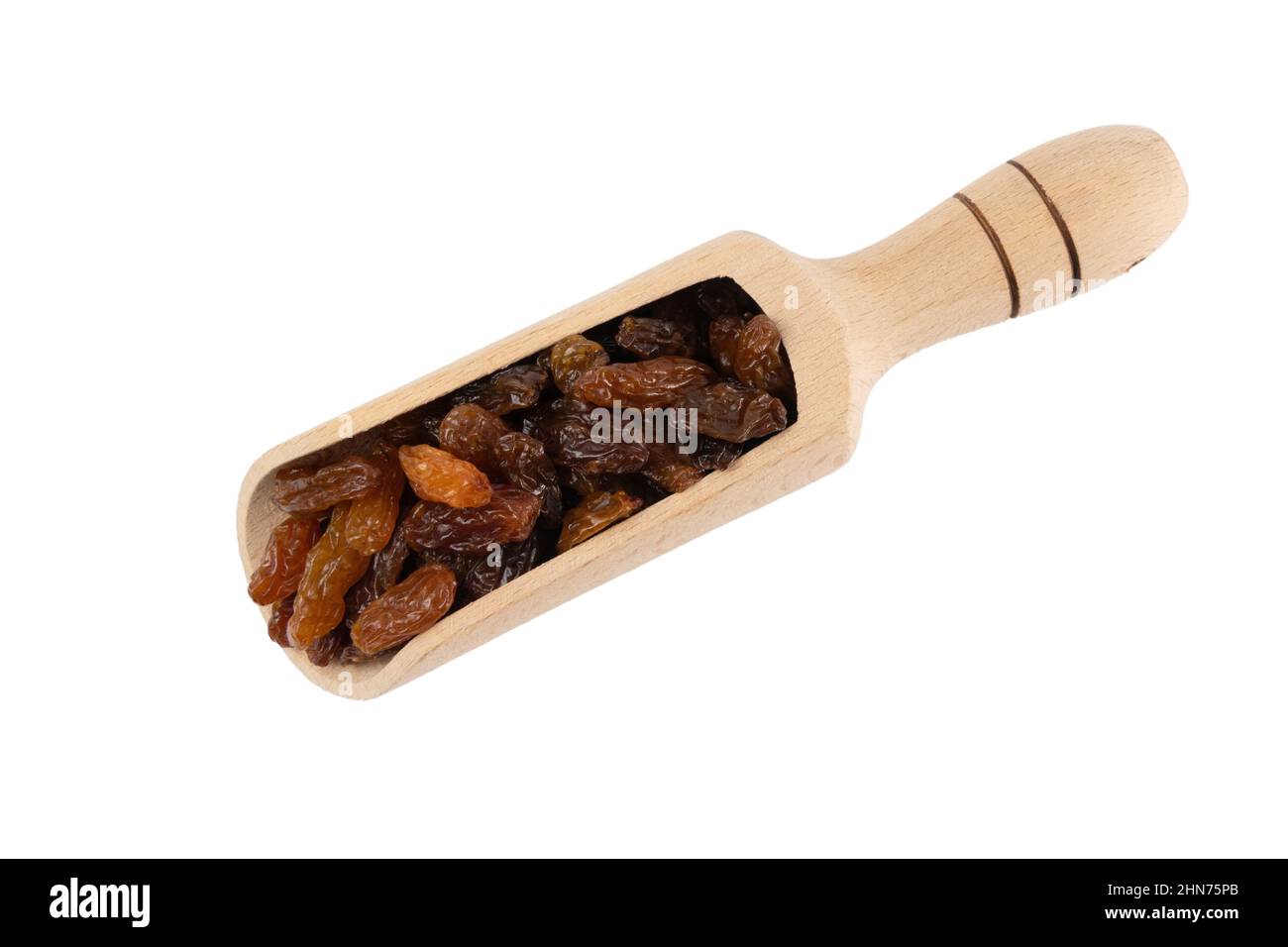 royal raisins in wooden scoop isolated on white background. Spice and ...