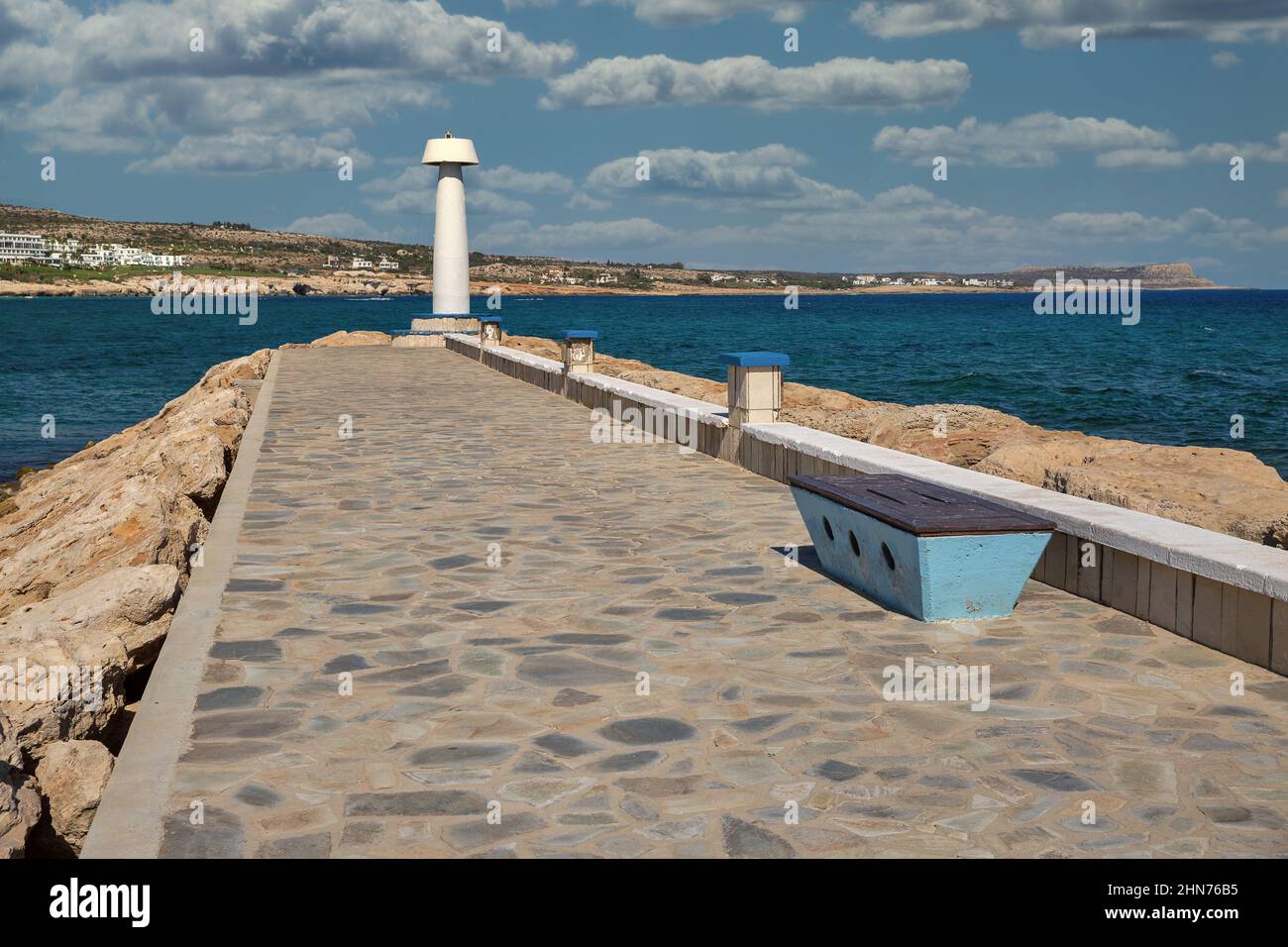 Ayia Napa lighthouse in Cyprus. Cityscape and clouds Stock Photo - Alamy