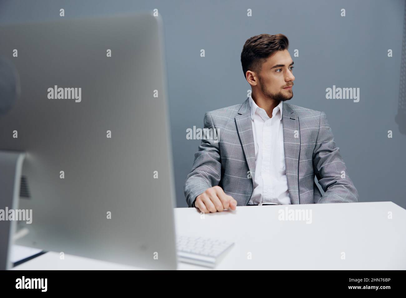 businessmen working at the computer in the office isolated background ...
