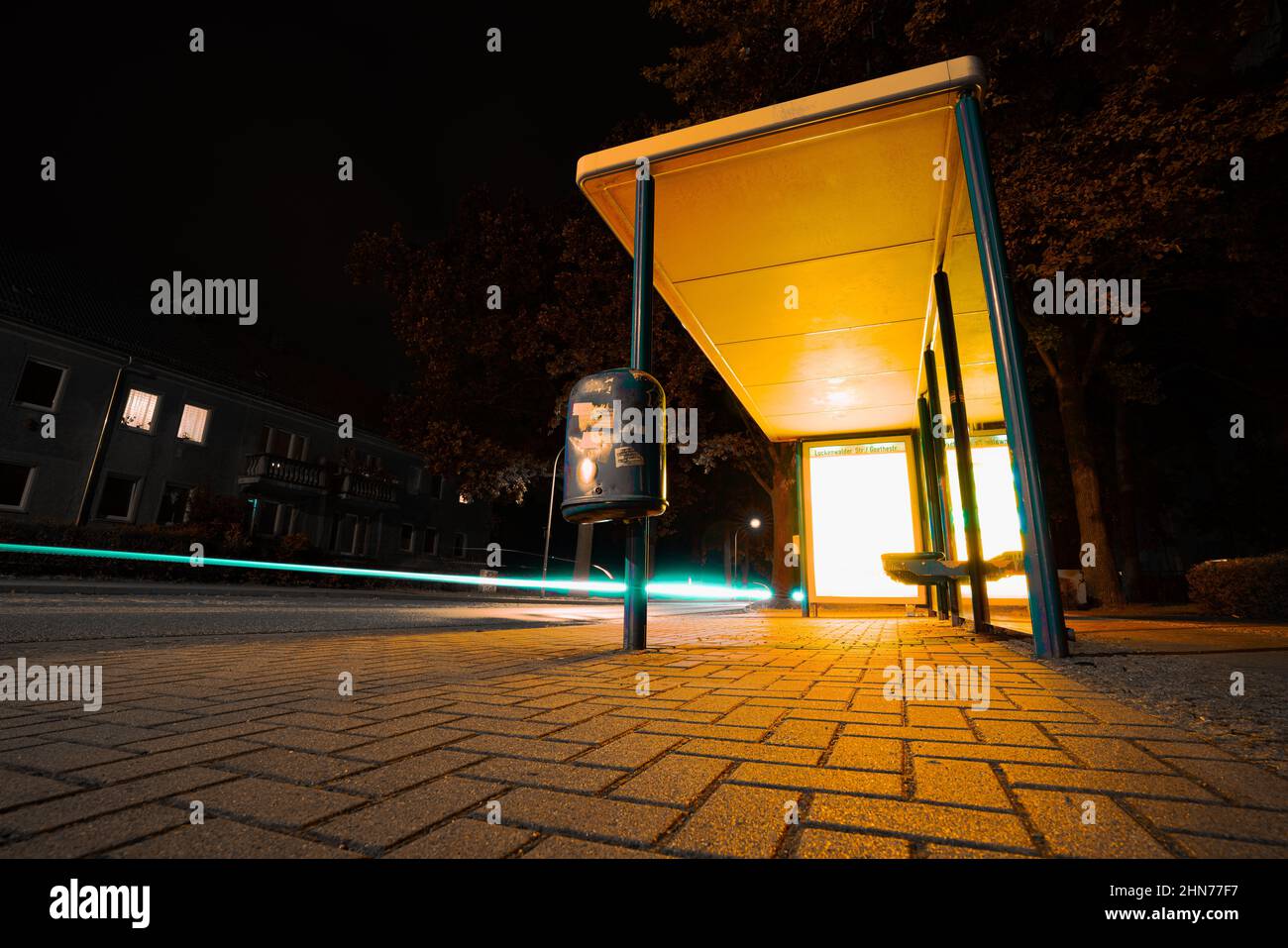 Bus stop in Germany in a long time exposure with bright lights Stock ...