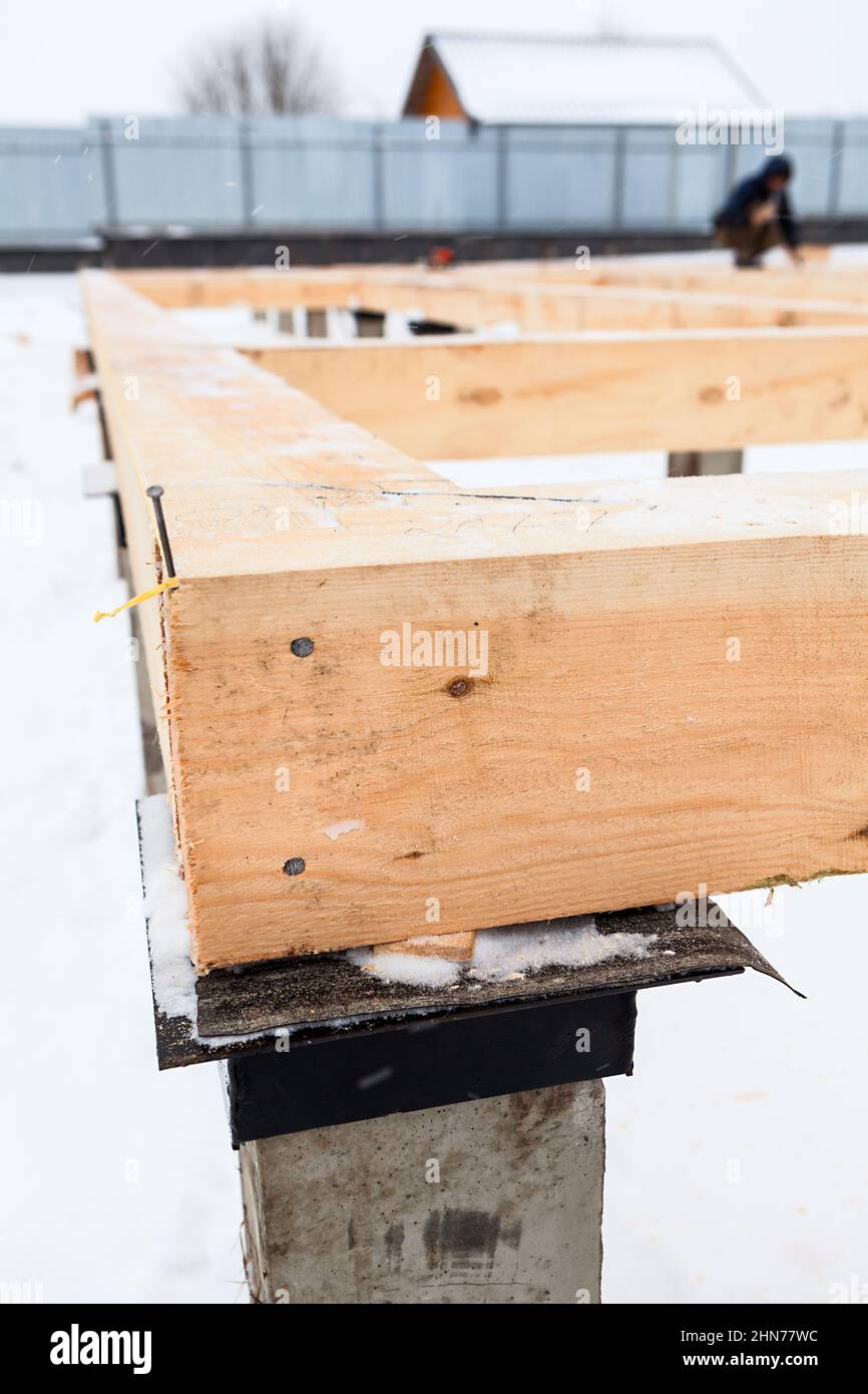 Close up view at conection of square-sawn timbers as beams for flooring ...