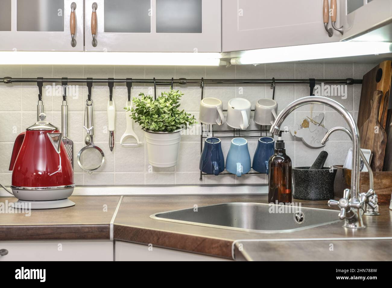 Red electric kettle in retro slile in kitchen interior closeup Stock ...
