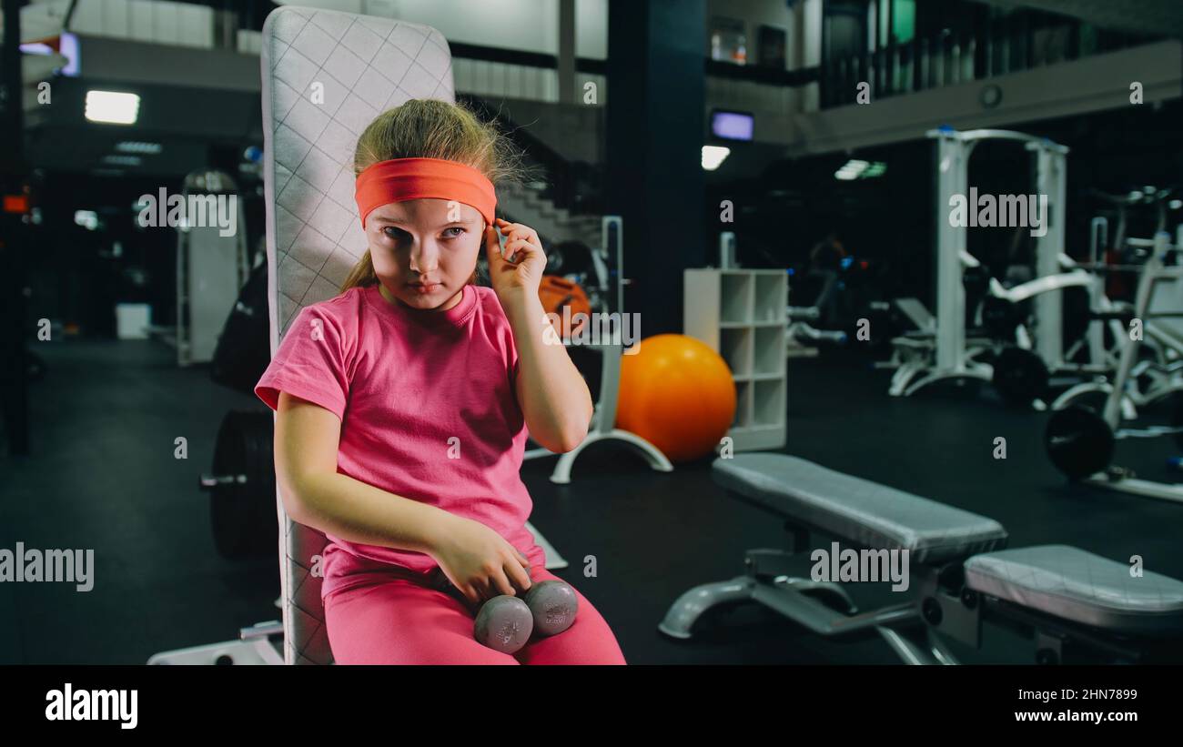 Fit Athletic Baby Girl Work out with Dumbbell, Doing Her Fitness ...