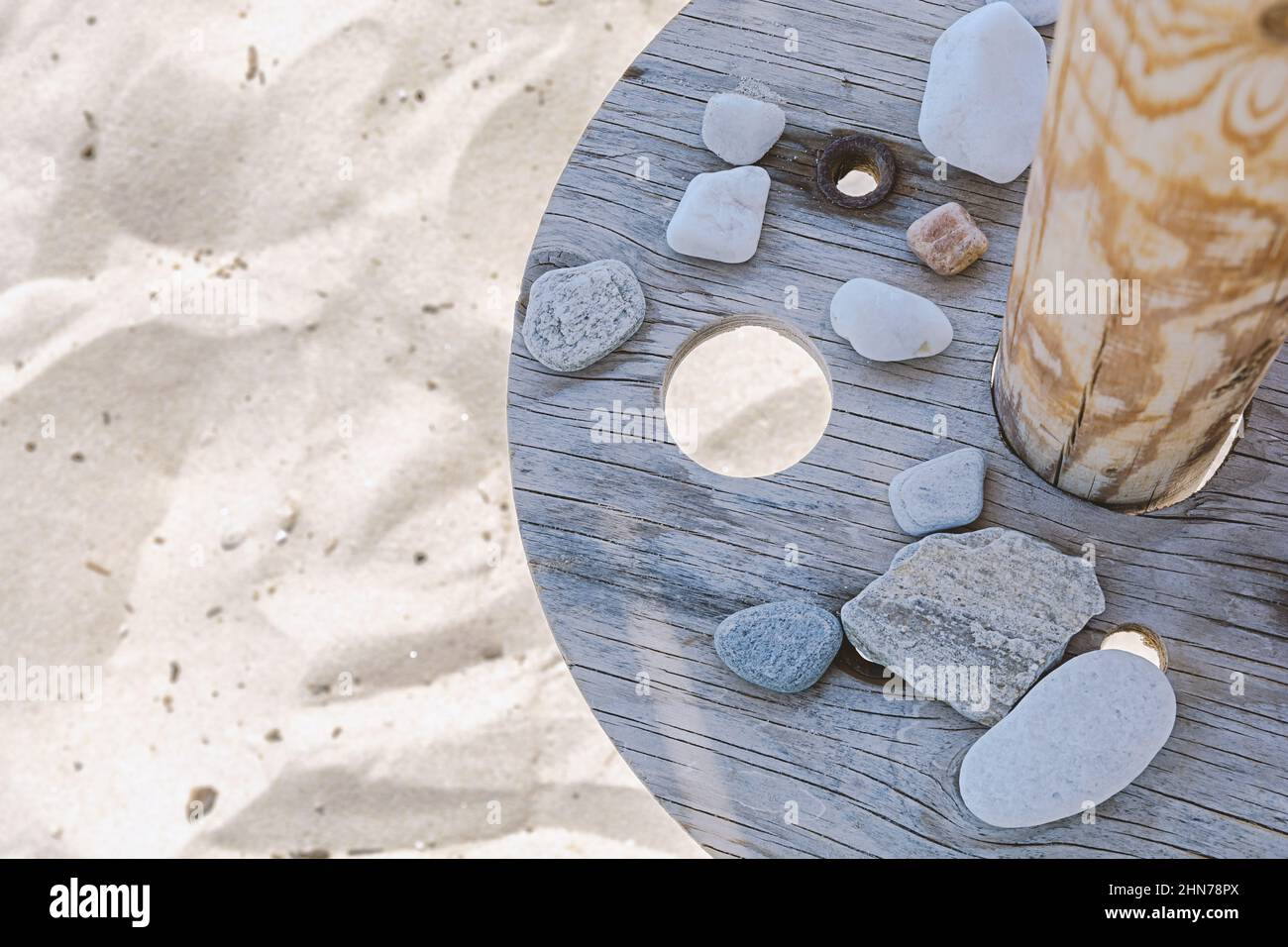 Sea sand and pebbels wooden table top view Stock Photo - Alamy