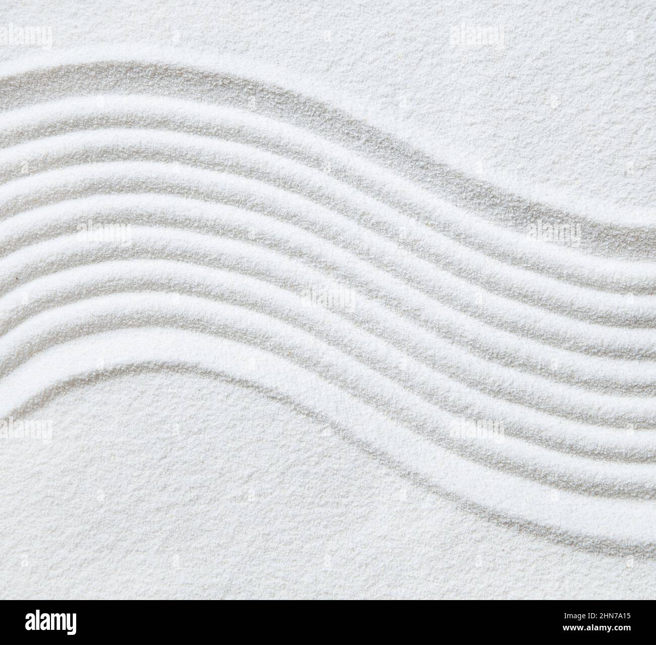 Zen pattern in white sand Stock Photo - Alamy