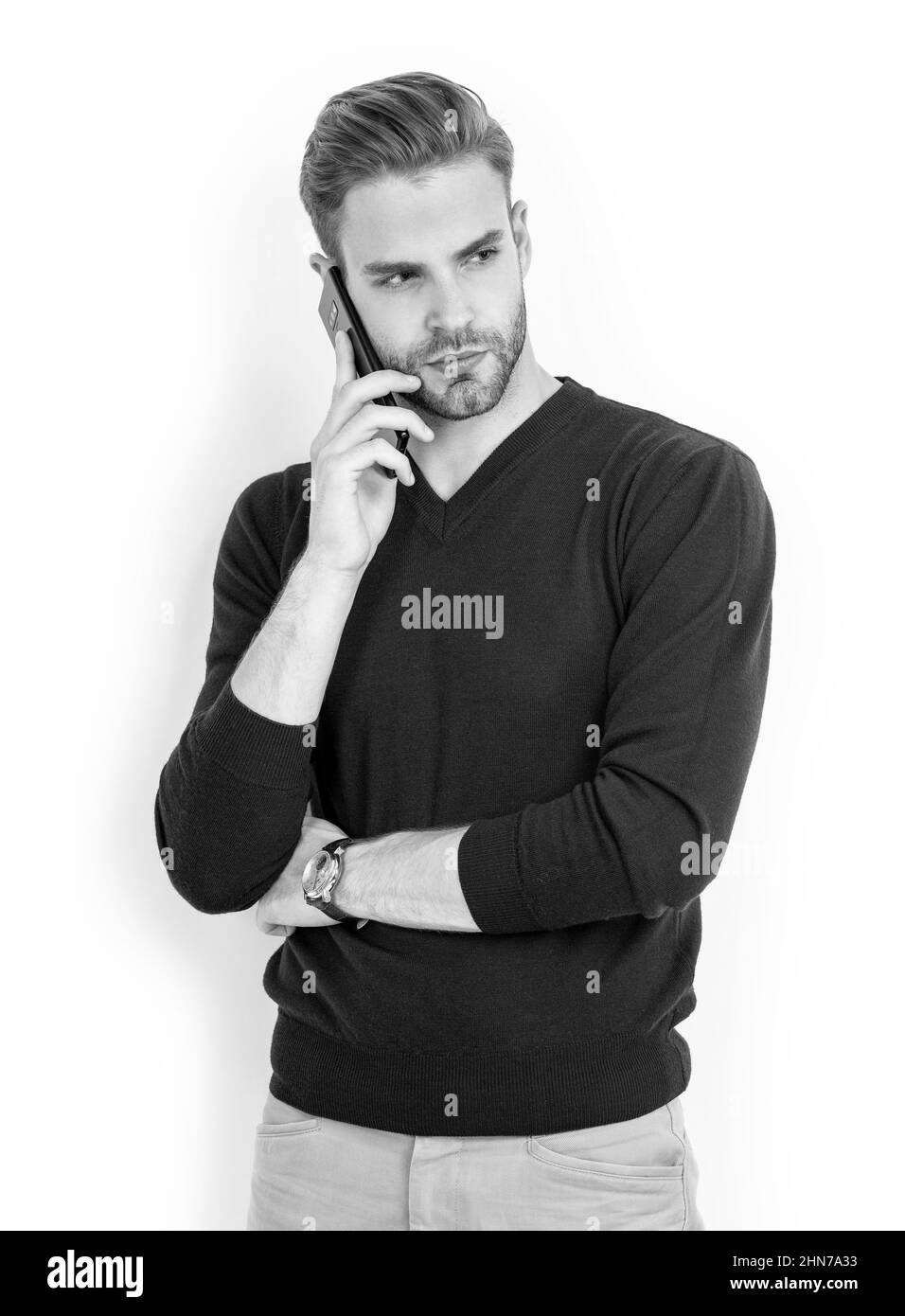 Guy making mobile device review or feedback Black and White Stock ...